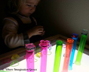 Light Table Free Play with Loose Parts - Where Imagination Grows